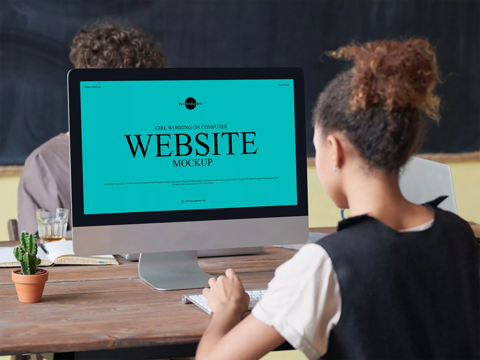 Girl Working on iMac Website Design Mockup | Free Mockup