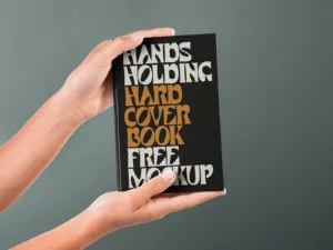 Hands Holding Hardcover Book Mockup PSD | Free Mockup