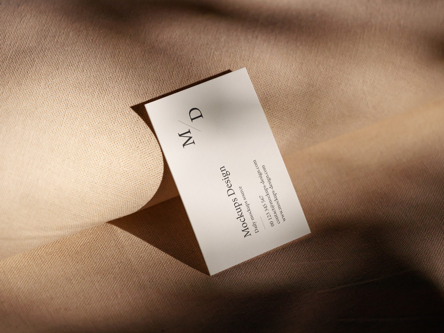 Realistic Business Card Mockup on a Fabric | The Free Mockup