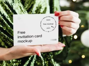 Hand Holding Invitation Card Mockup | The Free Mockup