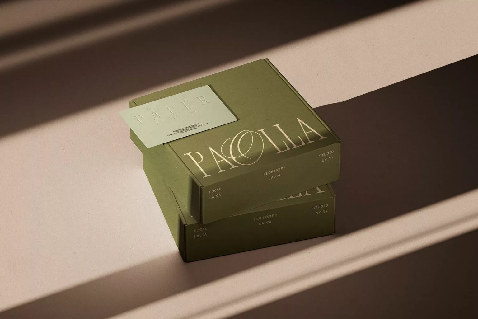 Cardboard Mailer Box with Paper Mockups | The Free Mockup