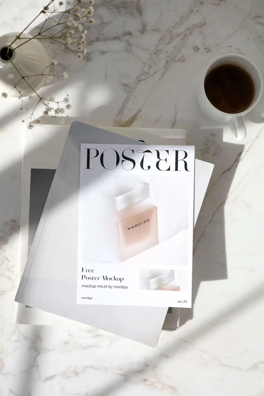 Poster/Paper Mockup on Book (Top View) | The Free Mockup