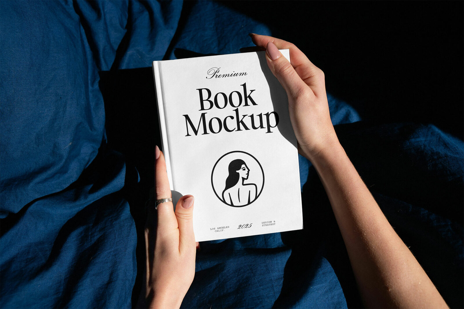 Free Hardcover Book Mockup held in Hands